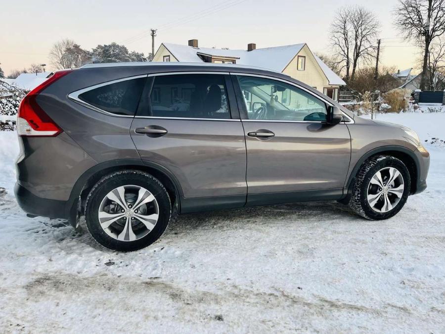Brown Honda CR-V 2014 in Trakai, with an engine capacity of 2.00 L and mileage of 286 thousand km for 7890 €, photo 2 on AUTOMOTO.COM.LV