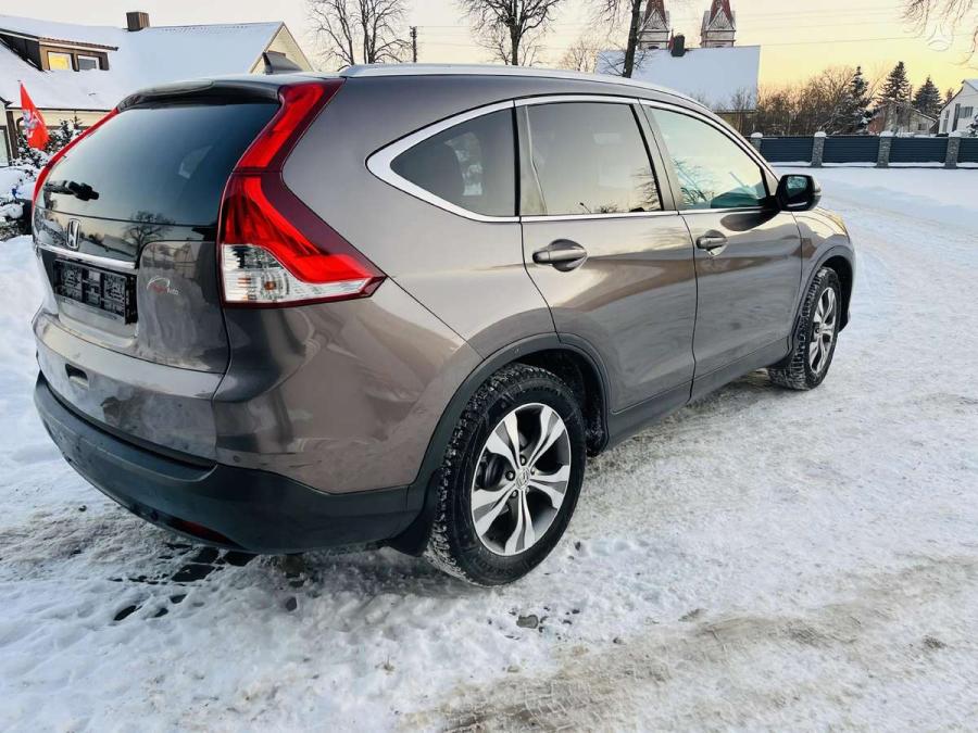 Brown Honda CR-V 2014 in Trakai, with an engine capacity of 2.00 L and mileage of 286 thousand km for 7890 €, photo 3 on AUTOMOTO.COM.LV