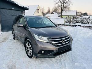 Brown Honda CR-V 2014 in Trakai, with an engine capacity of 2.00 L and mileage of 286 thousand km for 7890 €, photo 4 on AUTOMOTO.COM.LV
