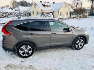Brown Honda CR-V 2014 in Trakai, with an engine capacity of 2.00 L and mileage of 286 thousand km for 7890 €, photo 6 on AUTOMOTO.COM.LV