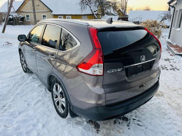 Brown Honda CR-V 2014 in Trakai, with an engine capacity of 2.00 L and mileage of 286 thousand km for 7890 €, photo 7 on AUTOMOTO.COM.LV