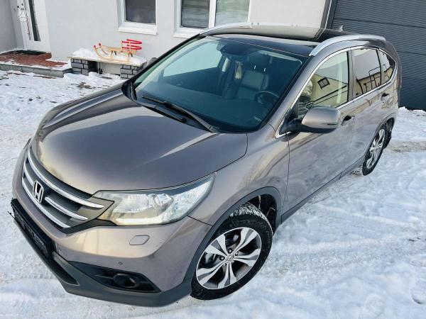 Brown Honda CR-V 2014 in Trakai, with an engine capacity of 2.00 L and mileage of 286 thousand km for 7890 €, photo 8 on AUTOMOTO.COM.LV