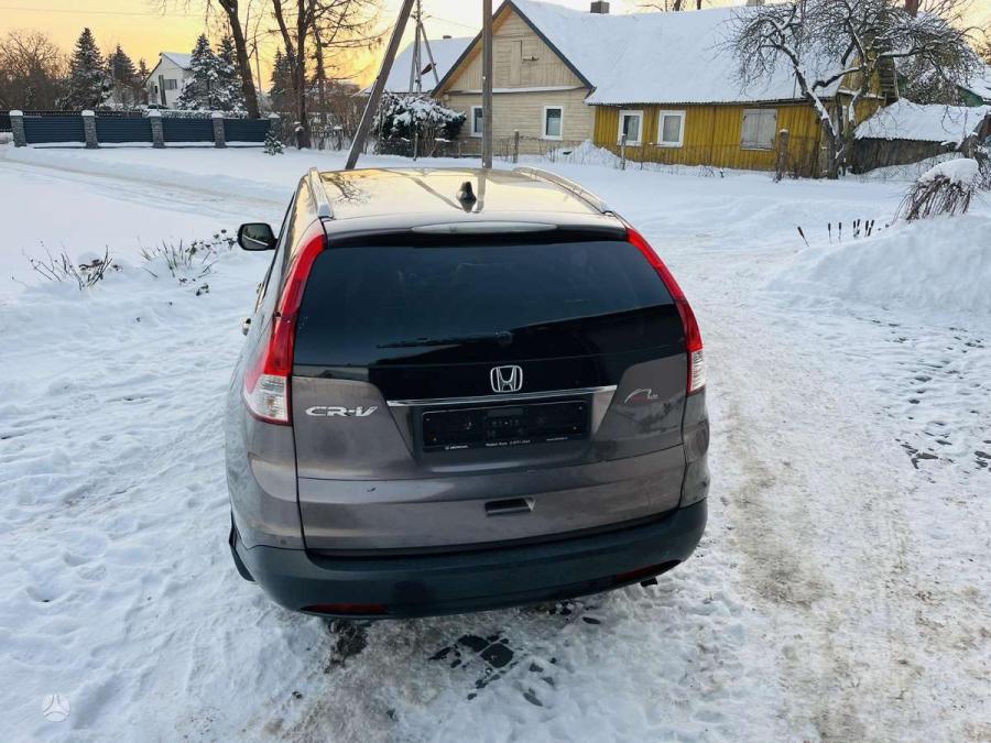 Brown Honda CR-V 2014 in Trakai, with an engine capacity of 2.00 L and mileage of 286 thousand km for 7890 €, photo 10 on AUTOMOTO.COM.LV