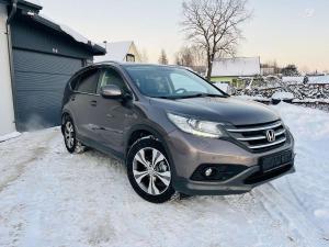 Brown Honda CR-V 2014 in Trakai, with an engine capacity of 2.00 L and mileage of 286 thousand km for 7890 €, photo 13 on AUTOMOTO.COM.LV