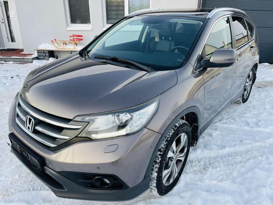 Brown Honda CR-V 2014 in Trakai, with an engine capacity of 2.00 L and mileage of 286 thousand km for 7890 €, photo 14 on AUTOMOTO.COM.LV