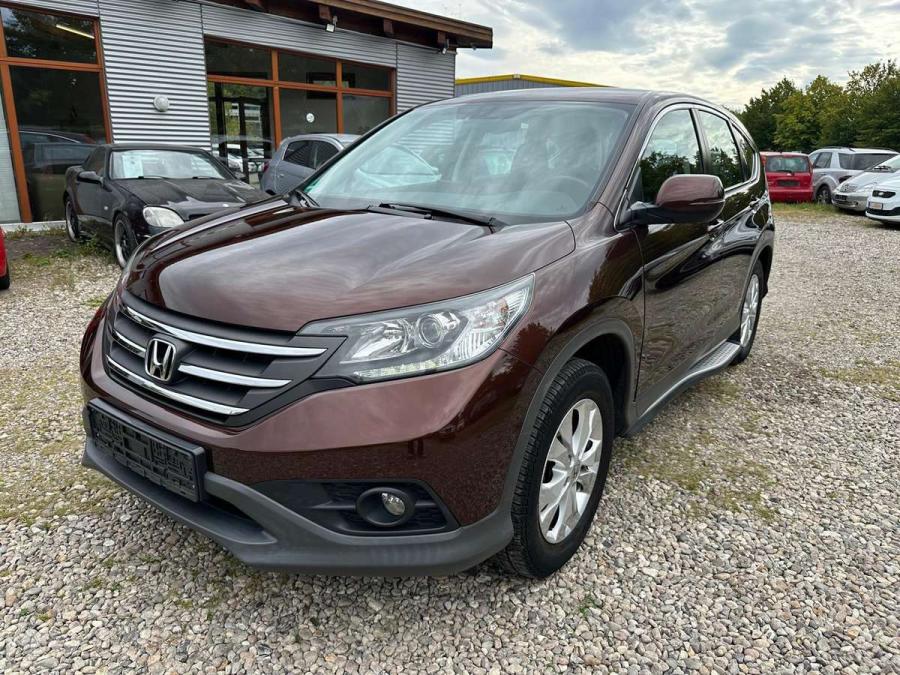Brown Honda CR-V 2014 in Siauliai, with an engine capacity of 2.00 L and mileage of 113 thousand km for 12999 €, photo 1 on AUTOMOTO.COM.LV