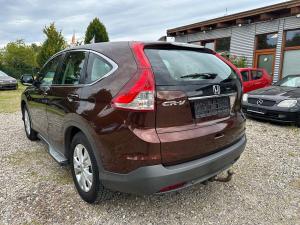 Brown Honda CR-V 2014 in Siauliai, with an engine capacity of 2.00 L and mileage of 113 thousand km for 12999 €, photo 3 on AUTOMOTO.COM.LV