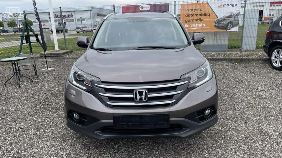 Brown Honda CR-V 2014 in Marijampole, with an engine capacity of 2.20 L and mileage of 172 thousand km for 10990 €, photo 3 on AUTOMOTO.COM.LV