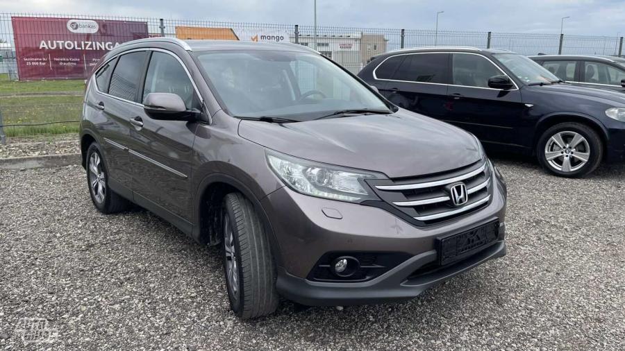 Brown Honda CR-V 2014 in Marijampole, with an engine capacity of 2.20 L and mileage of 172 thousand km for 10990 €, photo 5 on AUTOMOTO.COM.LV