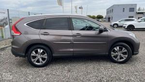 Brown Honda CR-V 2014 in Marijampole, with an engine capacity of 2.20 L and mileage of 172 thousand km for 10990 €, photo 6 on AUTOMOTO.COM.LV