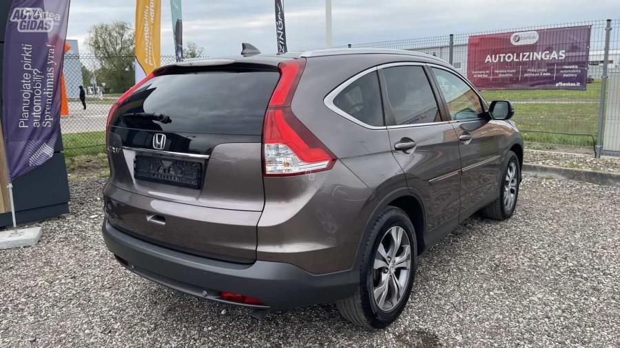 Brown Honda CR-V 2014 in Marijampole, with an engine capacity of 2.20 L and mileage of 172 thousand km for 10990 €, photo 7 on AUTOMOTO.COM.LV