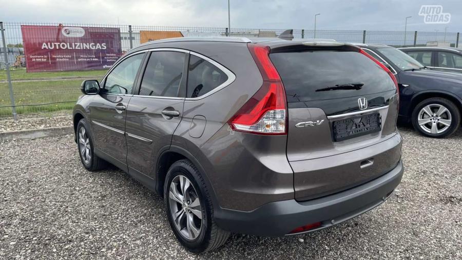 Brown Honda CR-V 2014 in Marijampole, with an engine capacity of 2.20 L and mileage of 172 thousand km for 10990 €, photo 10 on AUTOMOTO.COM.LV
