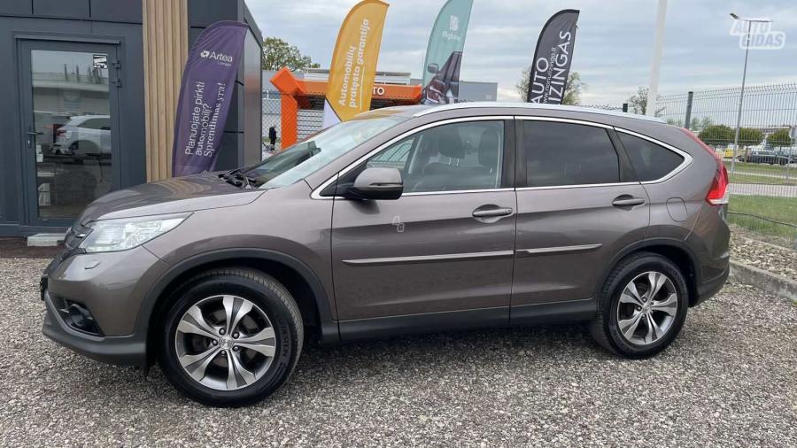 Brown Honda CR-V 2014 in Marijampole, with an engine capacity of 2.20 L and mileage of 172 thousand km for 10990 €, photo 11 on AUTOMOTO.COM.LV