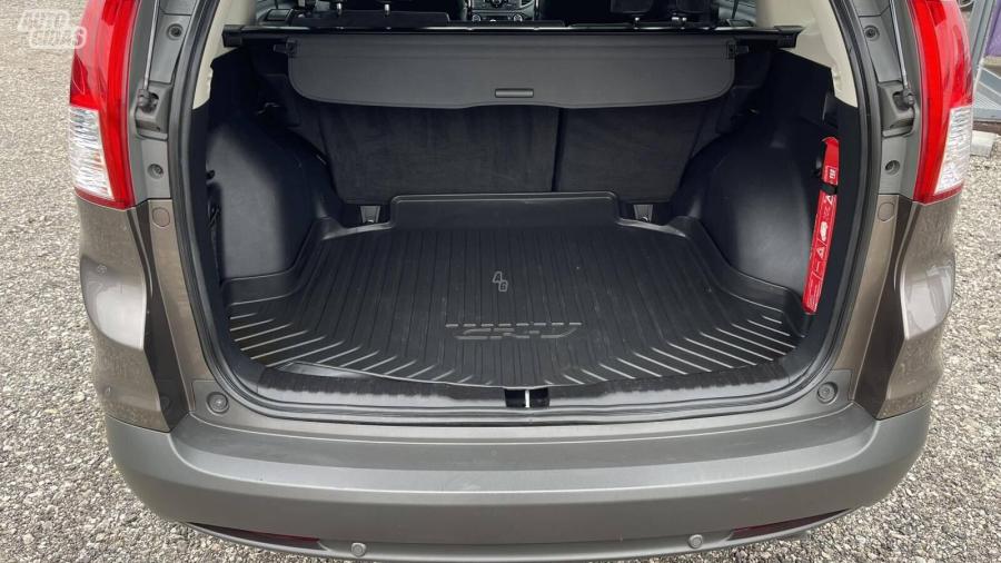 Brown Honda CR-V 2014 in Marijampole, with an engine capacity of 2.20 L and mileage of 172 thousand km for 10990 €, photo 32 on AUTOMOTO.COM.LV