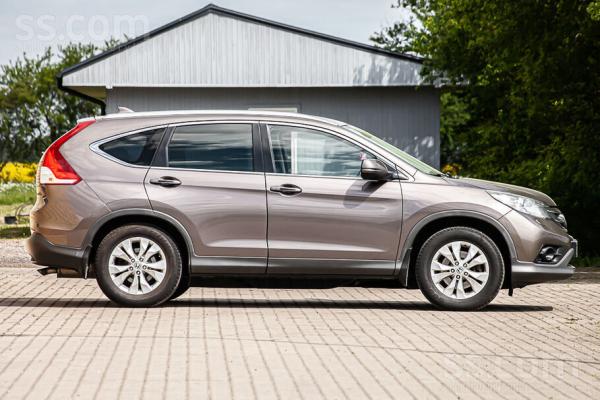 Brown Honda CR-V 2014 in Tukums, with an engine capacity of 2.20 L and mileage of 0 thousand km for 7390 €, photo 2 on AUTOMOTO.COM.LV