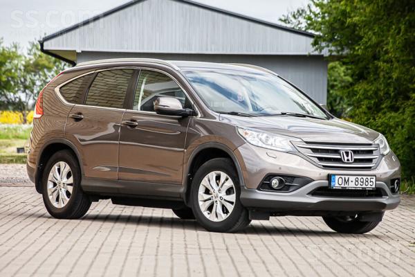 Brown Honda CR-V 2014 in Tukums, with an engine capacity of 2.20 L and mileage of 0 thousand km for 7390 €, photo 5 on AUTOMOTO.COM.LV