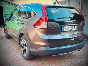 Brūns Honda CR-V 2014 Daugavpils, ar dzinēja tilpumu 1.60 L un nobraukumu 195 tūkst. km par 10700 €, foto  vietnē AUTOMOTO.COM.LV