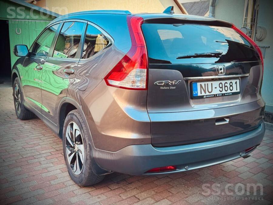 Brūns Honda CR-V 2014 Daugavpils, ar dzinēja tilpumu 1.60 L un nobraukumu 195 tūkst. km par 10700 €, foto 1 vietnē AUTOMOTO.COM.LV