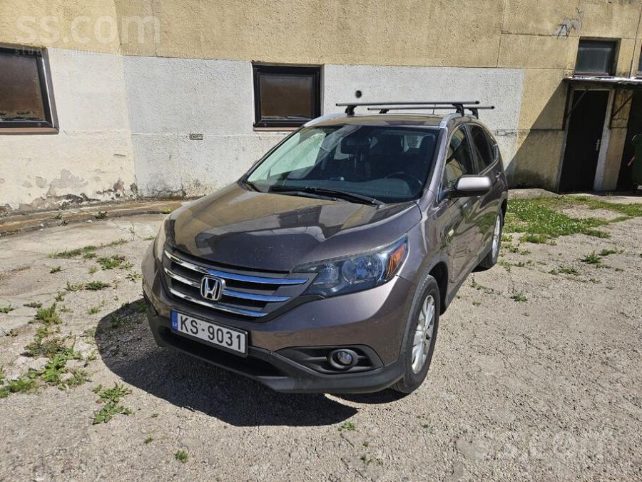 Brown Honda CR-V 2014 in Riga, with an engine capacity of 2.40 L and mileage of 135 thousand km for 8000 €, photo 3 on AUTOMOTO.COM.LV
