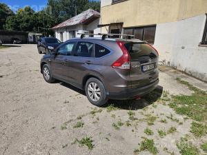 Brown Honda CR-V 2014 in Riga, with an engine capacity of 2.40 L and mileage of 135 thousand km for 8000 €, photo 4 on AUTOMOTO.COM.LV