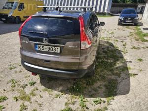 Brown Honda CR-V 2014 in Riga, with an engine capacity of 2.40 L and mileage of 135 thousand km for 8000 €, photo 5 on AUTOMOTO.COM.LV