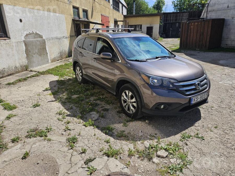 Brown Honda CR-V 2014 in Riga, with an engine capacity of 2.40 L and mileage of 135 thousand km for 8000 €, photo 6 on AUTOMOTO.COM.LV