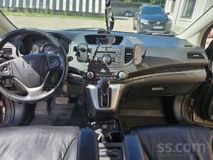 Brown Honda CR-V 2014 in Riga, with an engine capacity of 2.40 L and mileage of 135 thousand km for 8000 €, photo 9 on AUTOMOTO.COM.LV