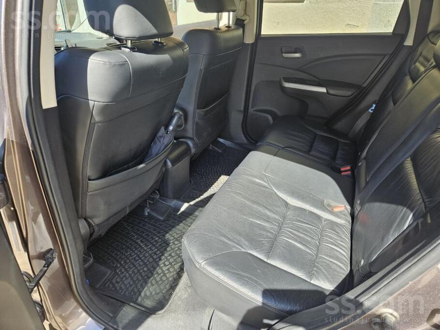 Brown Honda CR-V 2014 in Riga, with an engine capacity of 2.40 L and mileage of 135 thousand km for 8000 €, photo 11 on AUTOMOTO.COM.LV