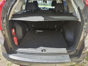 Brown Honda CR-V 2014 in Riga, with an engine capacity of 2.40 L and mileage of 135 thousand km for 8000 €, photo 13 on AUTOMOTO.COM.LV