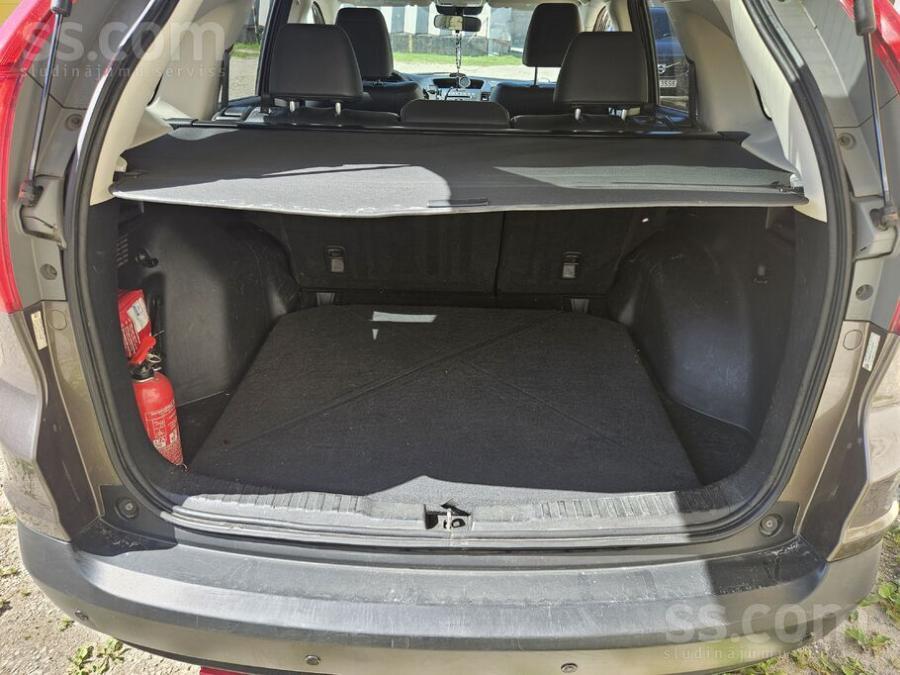 Brown Honda CR-V 2014 in Riga, with an engine capacity of 2.40 L and mileage of 135 thousand km for 8000 €, photo 13 on AUTOMOTO.COM.LV