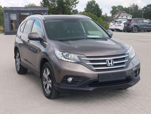 Brown Honda CR-V 2014 in Taurage, with an engine capacity of 1.60 L and mileage of 169 thousand km for 9000 €, photo 2 on AUTOMOTO.COM.LV
