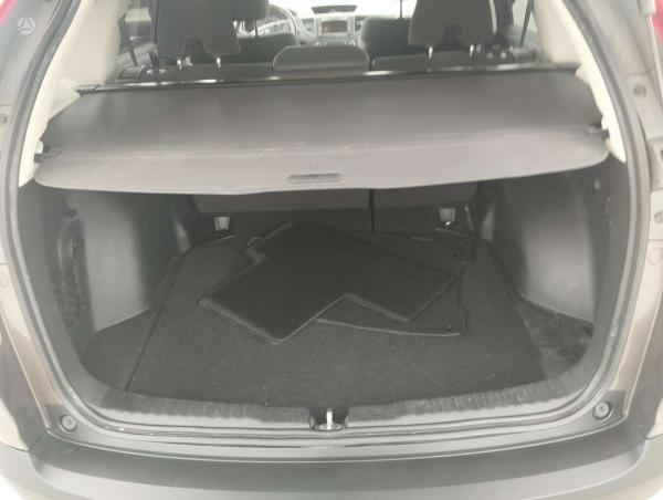 Brown Honda CR-V 2014 in Taurage, with an engine capacity of 1.60 L and mileage of 169 thousand km for 9000 €, photo 9 on AUTOMOTO.COM.LV