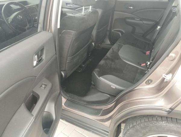 Brown Honda CR-V 2014 in Taurage, with an engine capacity of 1.60 L and mileage of 169 thousand km for 9000 €, photo 10 on AUTOMOTO.COM.LV