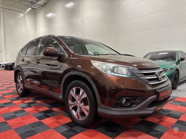 Brown Honda CR-V 2014 in Vilnius, with an engine capacity of 2.00 L and mileage of 149 thousand km for 13690 €, photo 3 on AUTOMOTO.COM.LV