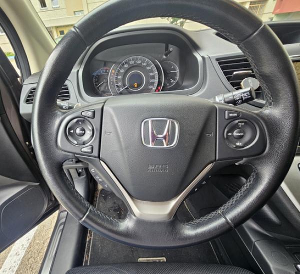 Brown Honda CR-V 2014 in Tallinn, with an engine capacity of 2.00 L and mileage of 98 thousand km for 13500 €, photo 4 on AUTOMOTO.COM.LV