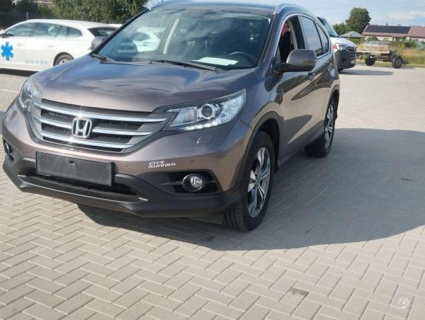 Brown Honda CR-V 2014 in Taurage, with an engine capacity of 1.60 L and mileage of 169 thousand km for 8800 €, photo 1 on AUTOMOTO.COM.LV