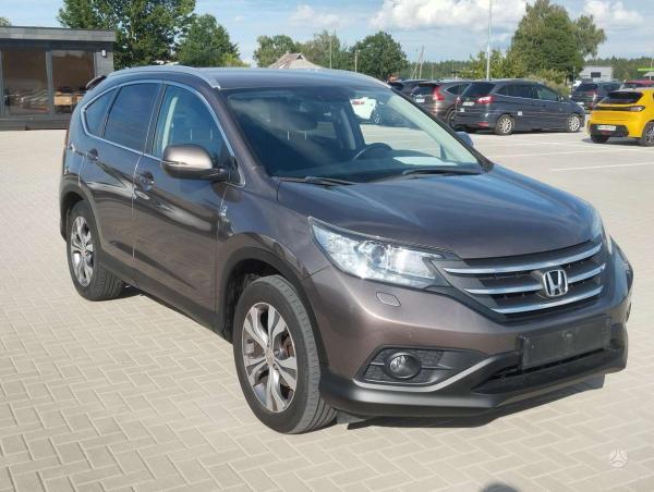 Brown Honda CR-V 2014 in Taurage, with an engine capacity of 1.60 L and mileage of 169 thousand km for 8800 €, photo 2 on AUTOMOTO.COM.LV