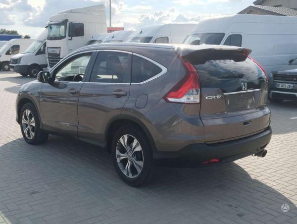 Brown Honda CR-V 2014 in Taurage, with an engine capacity of 1.60 L and mileage of 169 thousand km for 8800 €, photo 3 on AUTOMOTO.COM.LV