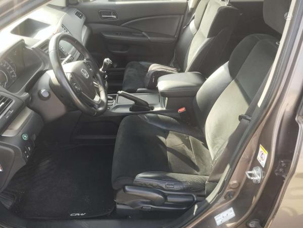 Brown Honda CR-V 2014 in Taurage, with an engine capacity of 1.60 L and mileage of 169 thousand km for 8800 €, photo 6 on AUTOMOTO.COM.LV