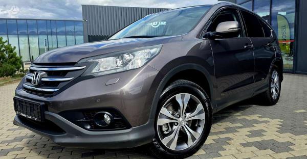 Brown Honda CR-V 2014 in Siauliai, with an engine capacity of 2.20 L and mileage of 240 thousand km for 11250 €, photo 5 on AUTOMOTO.COM.LV