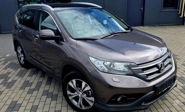 Brown Honda CR-V 2014 in Siauliai, with an engine capacity of 2.20 L and mileage of 240 thousand km for 11250 €, photo 10 on AUTOMOTO.COM.LV