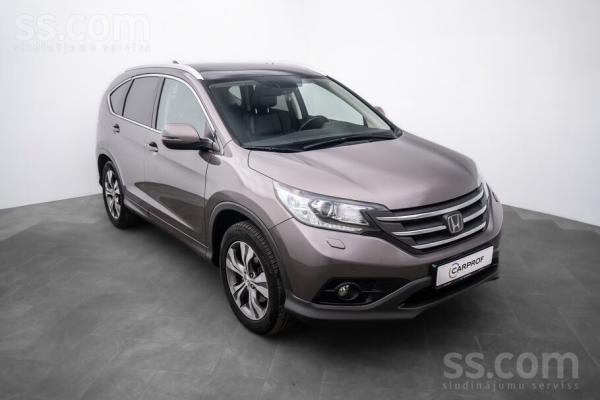 Brown Honda CR-V 2014 in Tallinn, with an engine capacity of 2.20 L and mileage of 228 thousand km for 9998 €, photo 5 on AUTOMOTO.COM.LV