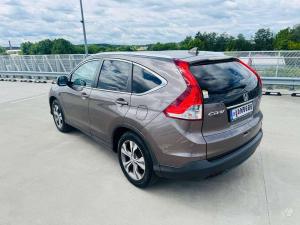 Brown Honda CR-V 2014 in Vilnius, with an engine capacity of 2.20 L and mileage of 223 thousand km for 11100 €, photo  on AUTOMOTO.COM.LV
