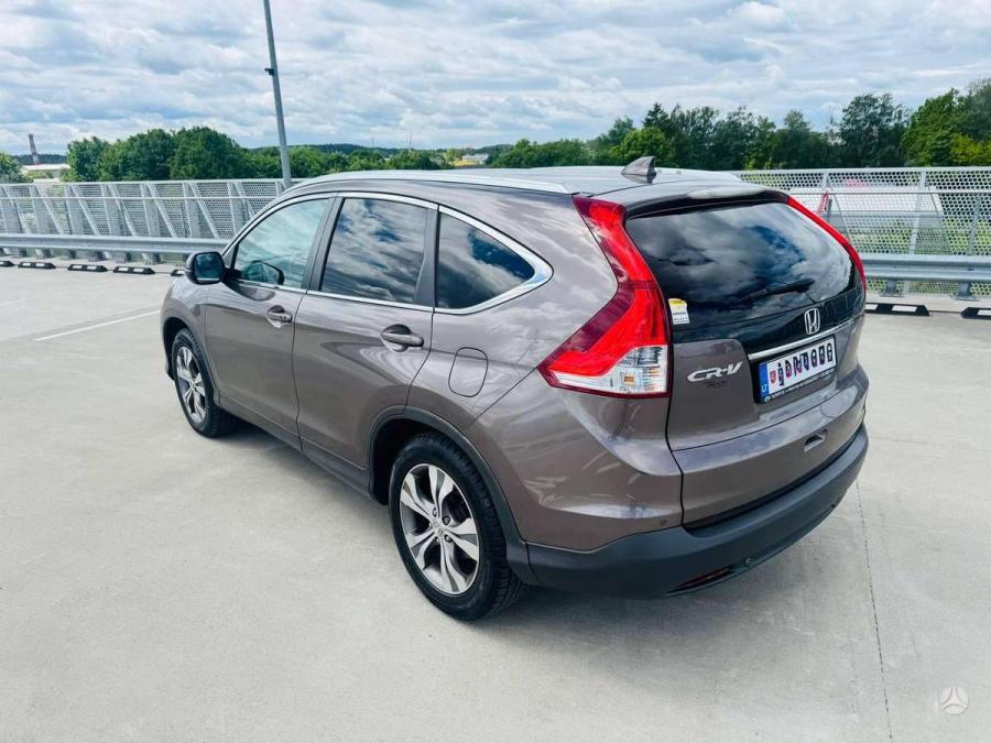 Brown Honda CR-V 2014 in Vilnius, with an engine capacity of 2.20 L and mileage of 223 thousand km for 11100 €, photo 1 on AUTOMOTO.COM.LV
