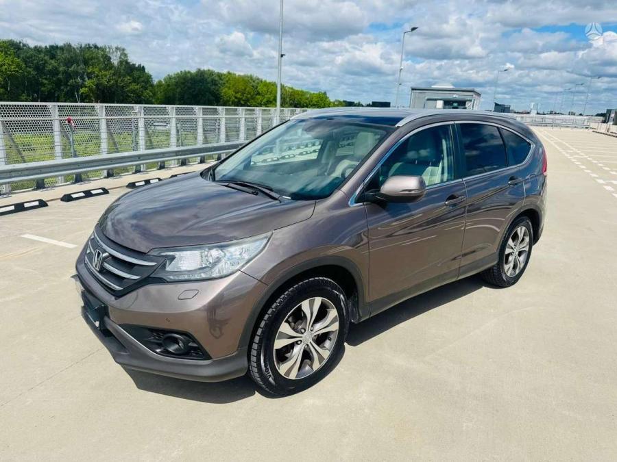 Brown Honda CR-V 2014 in Vilnius, with an engine capacity of 2.20 L and mileage of 223 thousand km for 11100 €, photo 5 on AUTOMOTO.COM.LV