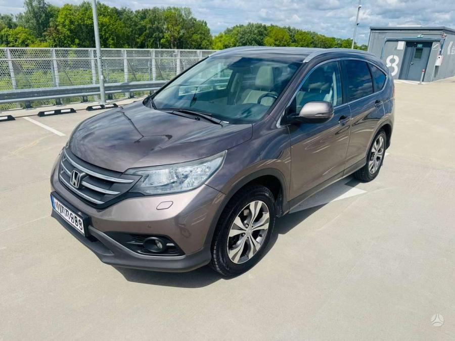 Brown Honda CR-V 2014 in Vilnius, with an engine capacity of 2.20 L and mileage of 223 thousand km for 11100 €, photo 11 on AUTOMOTO.COM.LV