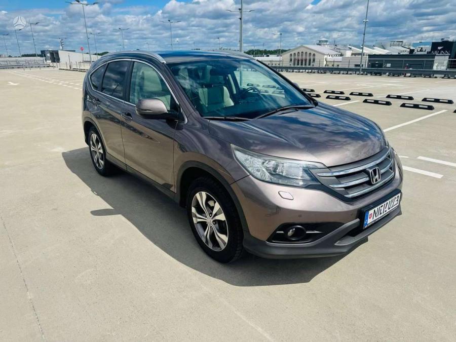 Brown Honda CR-V 2014 in Vilnius, with an engine capacity of 2.20 L and mileage of 223 thousand km for 11100 €, photo 12 on AUTOMOTO.COM.LV