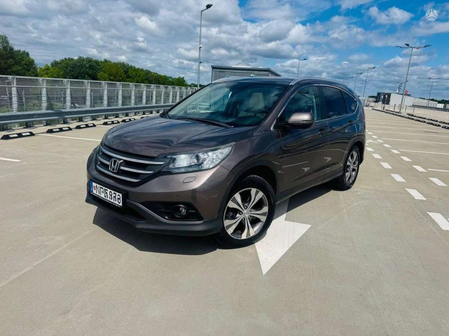 Brown Honda CR-V 2014 in Vilnius, with an engine capacity of 2.20 L and mileage of 223 thousand km for 11100 €, photo 17 on AUTOMOTO.COM.LV