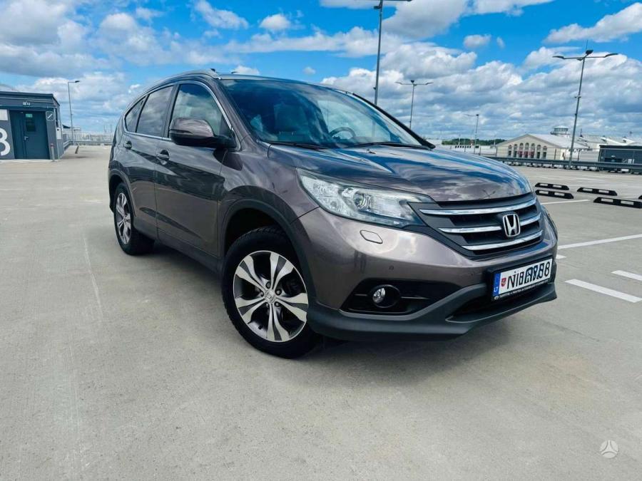 Brown Honda CR-V 2014 in Vilnius, with an engine capacity of 2.20 L and mileage of 223 thousand km for 11100 €, photo 19 on AUTOMOTO.COM.LV