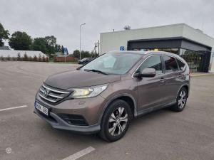 Brūns Honda CR-V 2014 Tauragė, ar dzinēja tilpumu 2.20 L un nobraukumu 170 tūkst. km par 7700 €, foto  vietnē AUTOMOTO.COM.LV